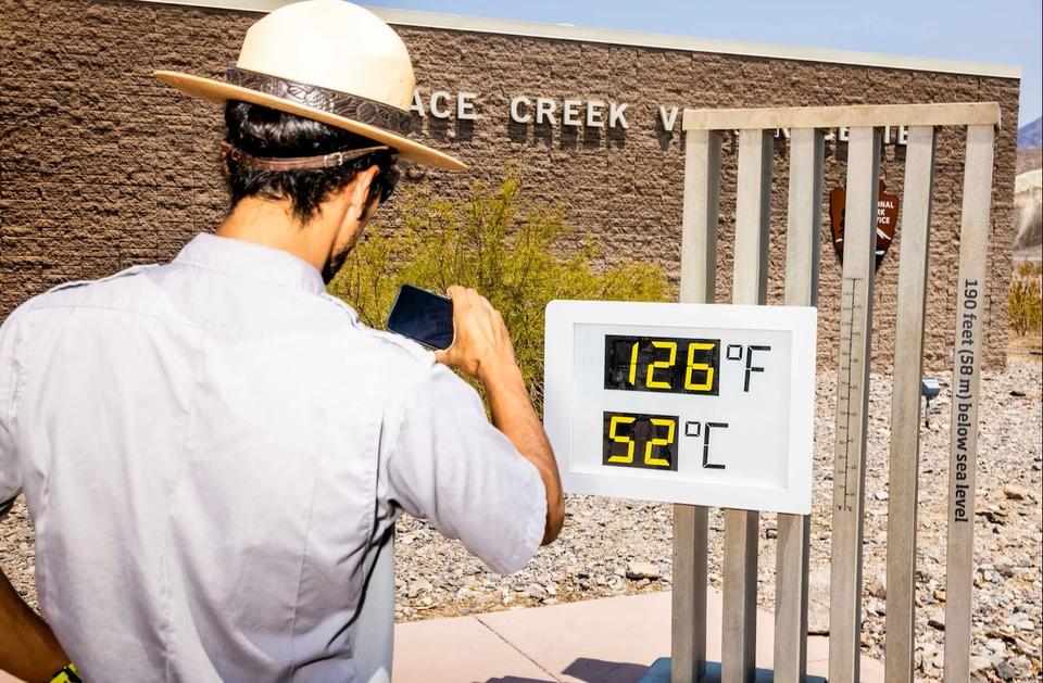 Park ranger viewing temperature