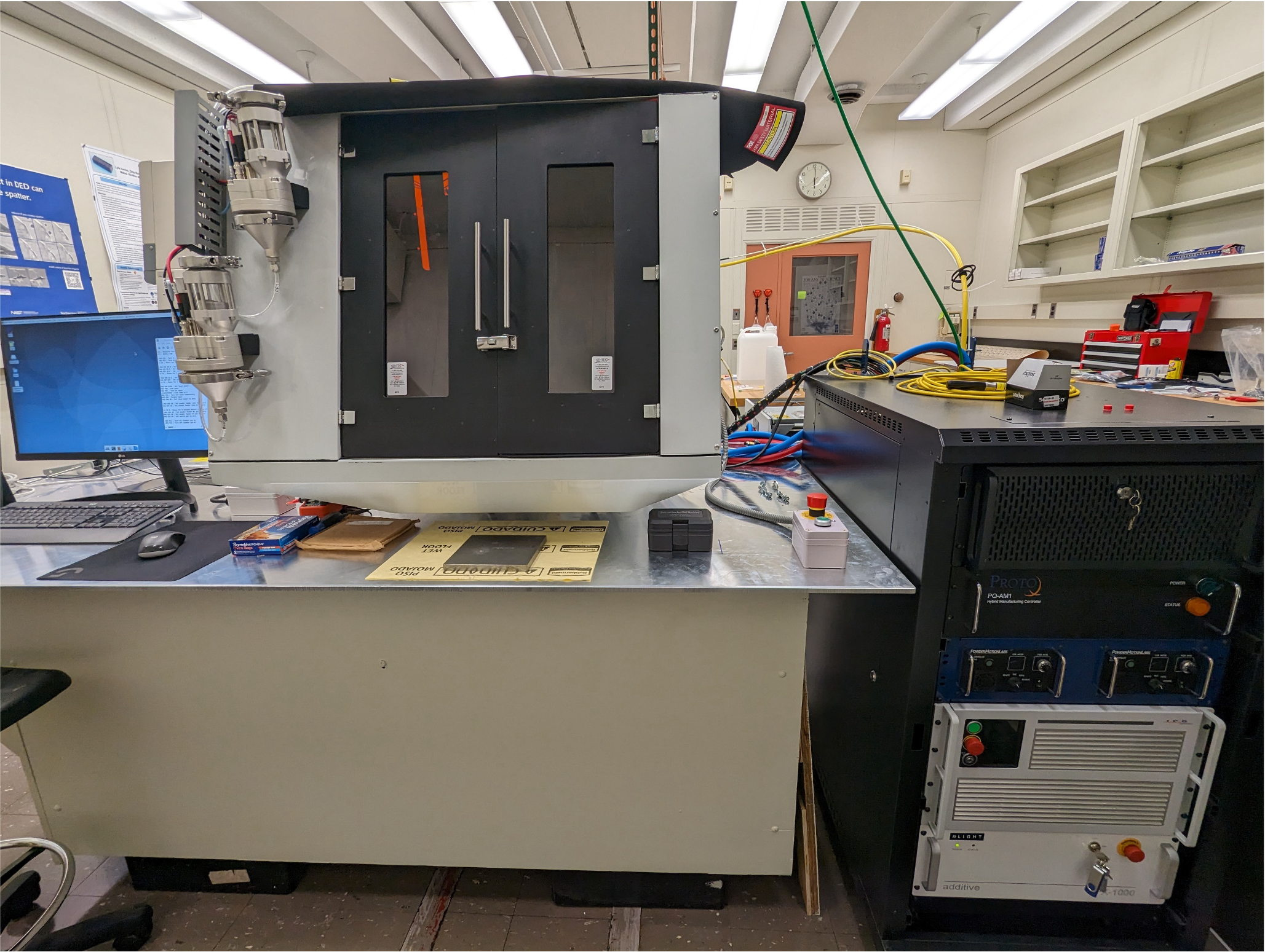 Small Scale Directed Energy Laser Deposition system for metallic systems