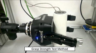Grasp strength test method with split cylinder artifact.