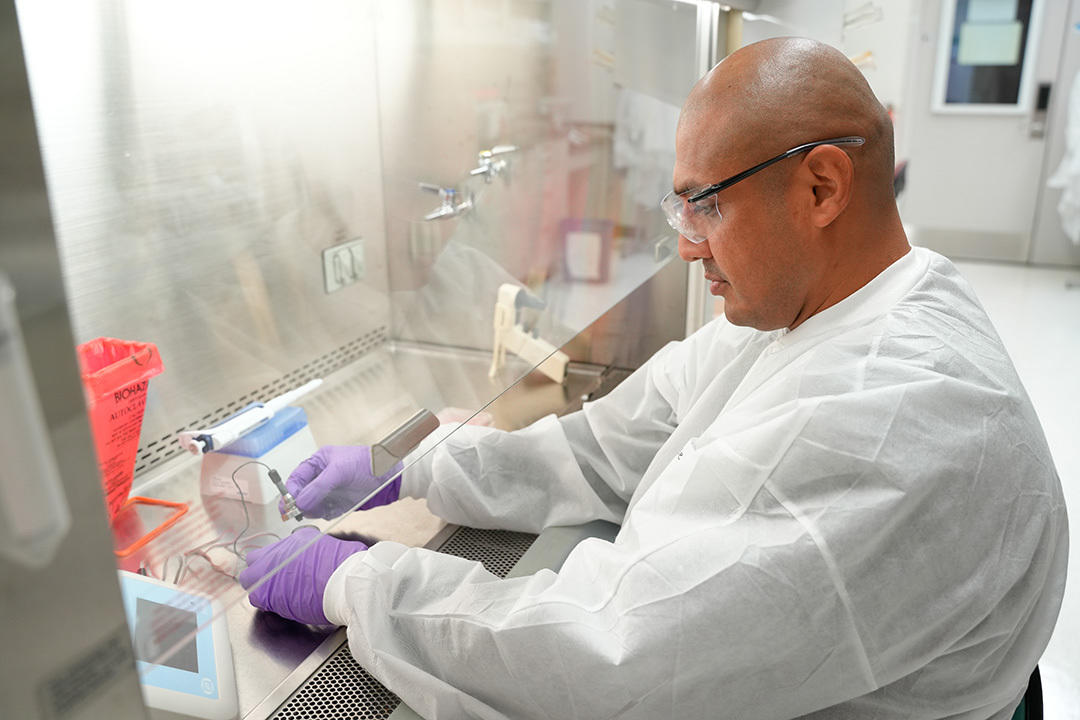 Robert Gutierrez with lab tools