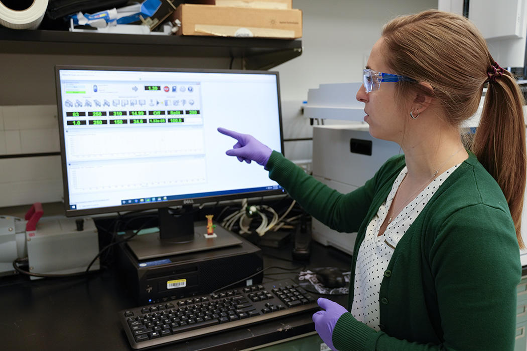 Briana Capistran with computer